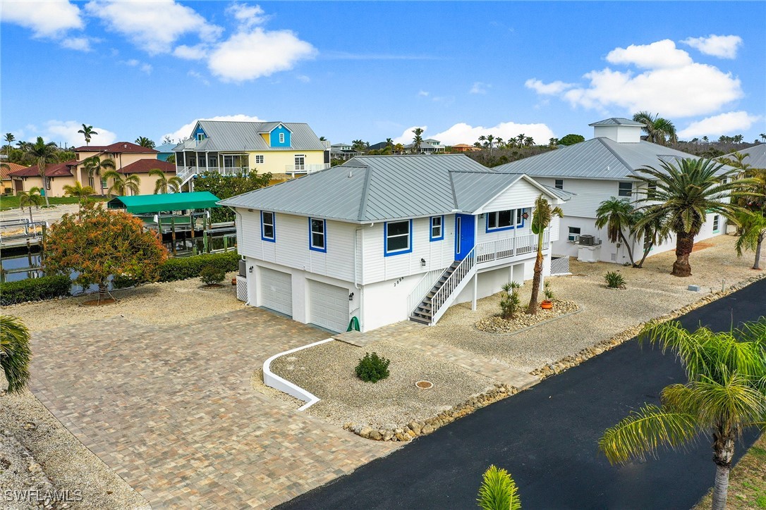 2896 Buttonwood Key Court, For Sale in St. James City - Zoocasa